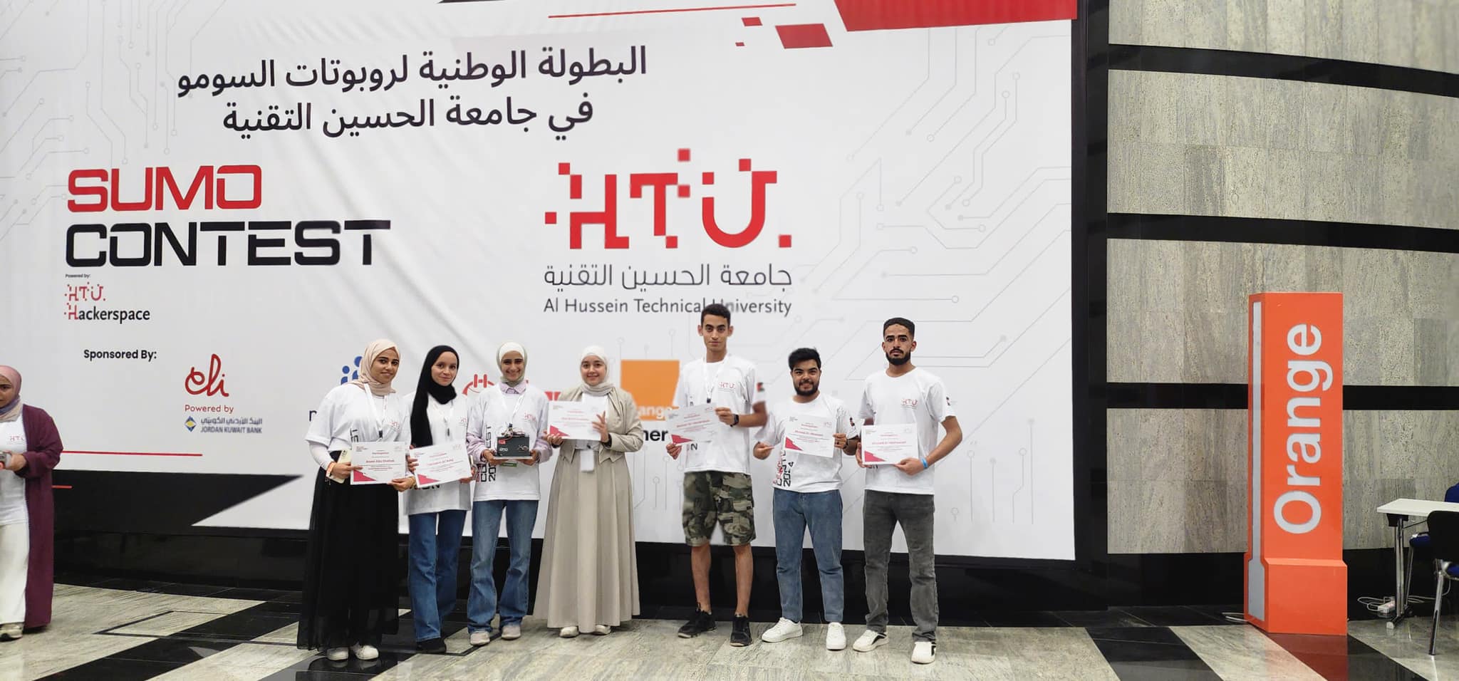 Al al-Bayt University is participating in a Sumo Robot competition.